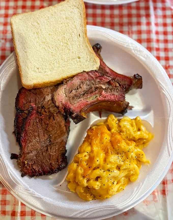 Smoky brisket next to creamy mac and cheese is the kind of pairing that makes you forget every diet you've ever attempted.