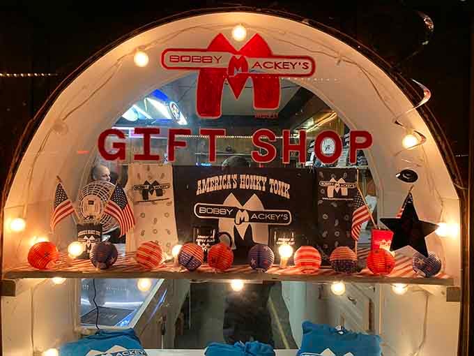 The gift shop glows like a carnival booth, offering souvenirs from America's most notorious honky-tonk experience.