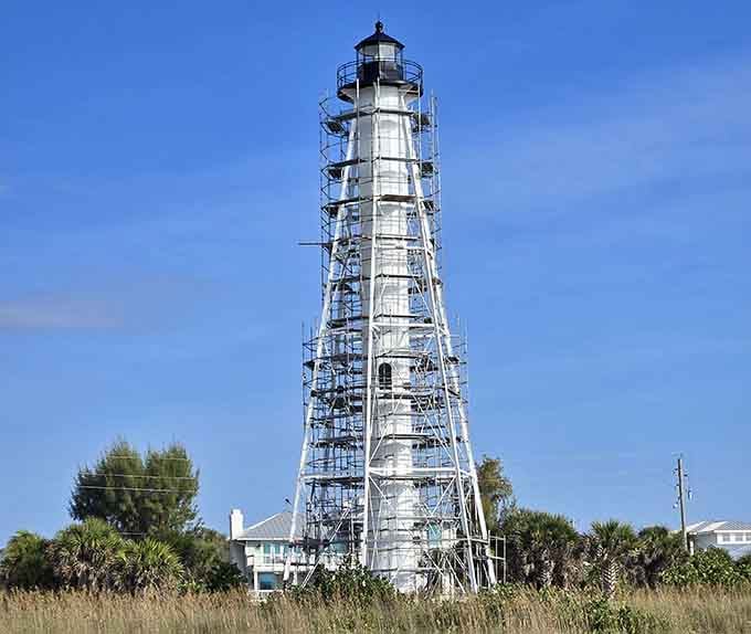 The Gasparilla Island Lighthouse stands tall, proving that good bones never go out of style, even with scaffolding.
