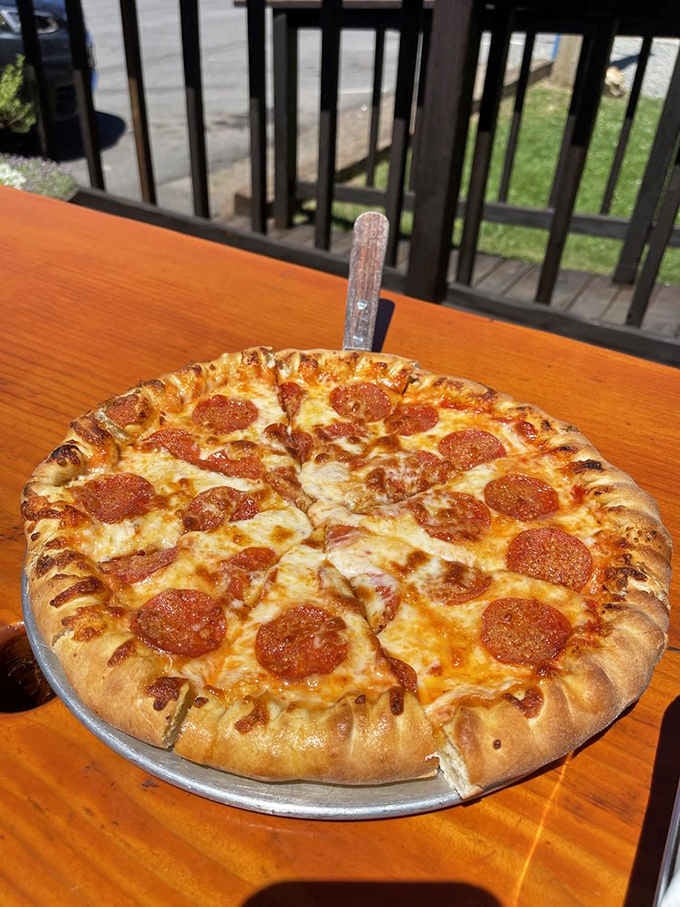 A classic pepperoni pizza so perfectly golden it could make a grown adult weep with joy.