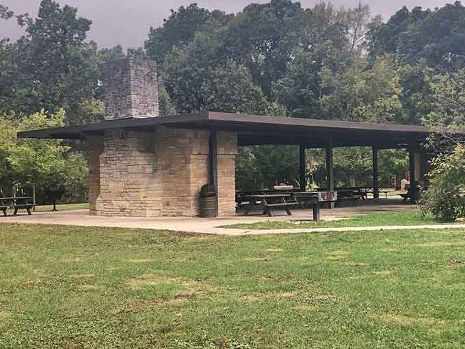 A picnic shelter that understands the assignment: provide shade, accommodate groups, and look pretty darn good doing it.