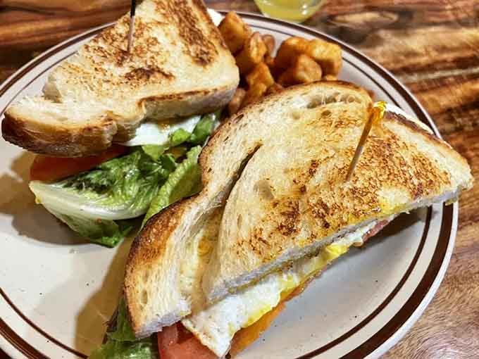 Grilled sourdough, fried eggs, and all the right fixings. This sandwich is proof that breakfast deserves better bread.