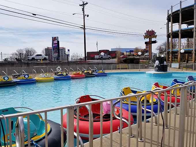 Colorful bumper boats waiting patiently, like the world's most cheerful traffic jam.