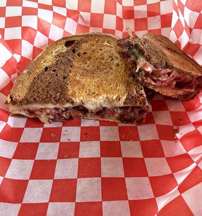 Charlie's Pastrami on Rye, toasted to a deep, gorgeous brown, is the kind of sandwich that silences a room.