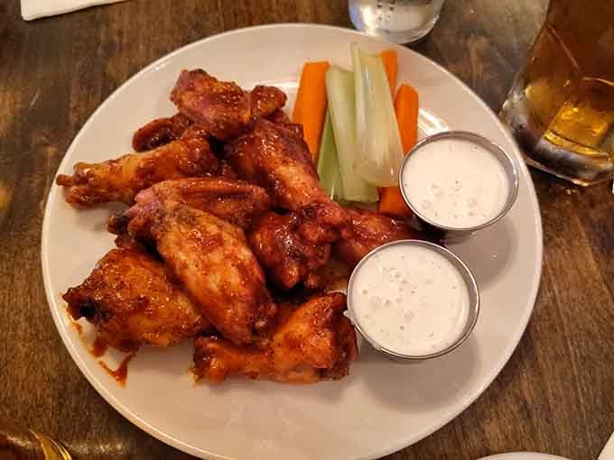 Crispy wings with cooling ranch prove that British pubs know their way around American favorites too.