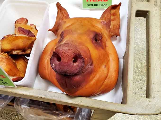 Friendly face, golden skin, and absolutely zero apologies — this smoked pig head means serious culinary business.