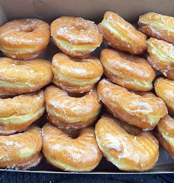 Golden, glazed, and stacked like edible treasure. These Dom Bakeries raised donuts mean serious business.