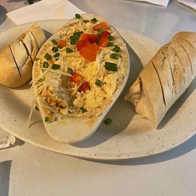 Warm, cheesy, and served with crusty bread. This crab dip is the kind of appetizer that ruins your appetite in the best possible way.