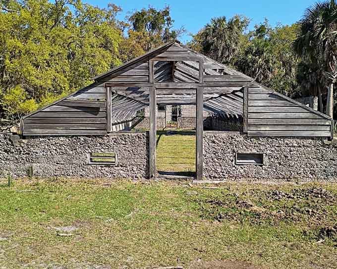 This skeletal wooden greenhouse frame standing on tabby walls is basically a poem about time passing.