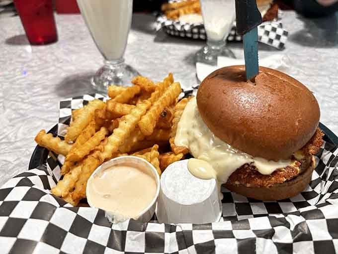 Melted cheese cascading over a hand-pressed patty &mdash; the Horse Shoe burger is gloriously, unapologetically over the top.