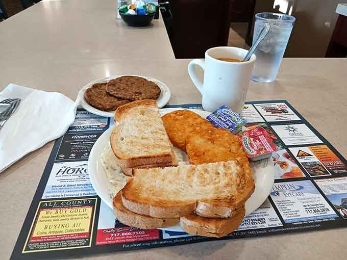 Golden toast, sausage patties, and a hot cup of coffee. Sometimes the simplest breakfast is the one you remember longest.