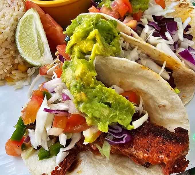 Blackened fish, fresh guacamole, pico de gallo, and cabbage slaw, these Ahi Tuna Tacos are genuinely showing off.
