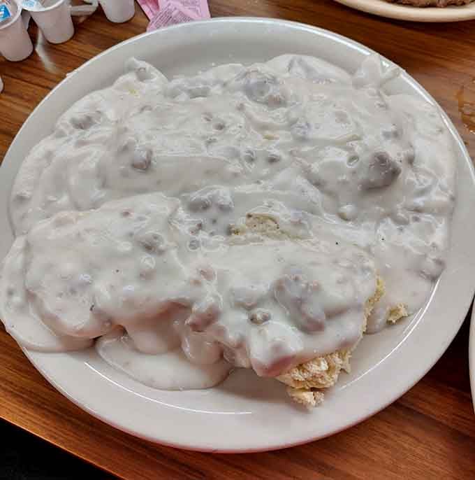 Biscuits and gravy done right, the kind that makes you want to cancel your afternoon plans entirely.