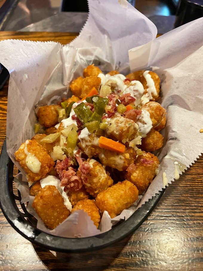 Loaded tater tots piled high with corned beef, giardiniera, and cream sauce. Comfort food just got a serious promotion.