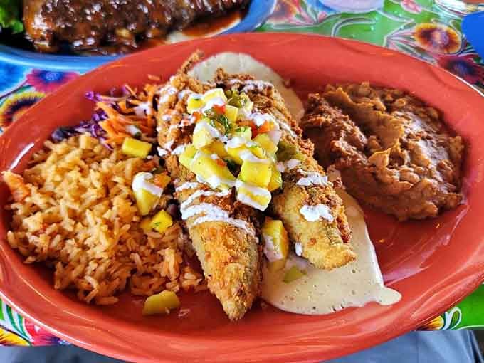 Crispy, golden, and topped with mango salsa, the Shrimp Chile Rellenos prove that fusion cooking can be pure genius.