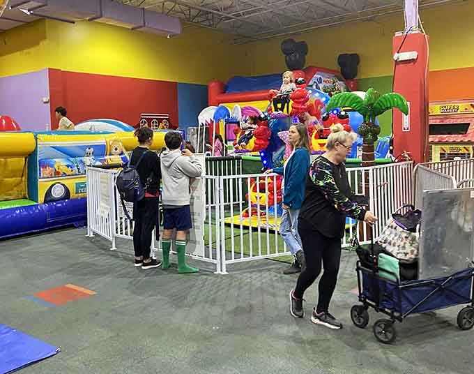 Families fill the colorful space, each one discovering their own favorite corner of this indoor wonderland.