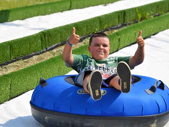 Two thumbs up says everything you need to know about this hill and this tube.