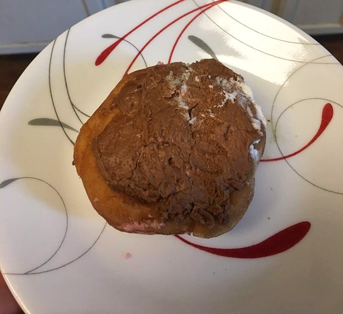 That cream filling is basically a hug from the inside out, wrapped in fried dough goodness.