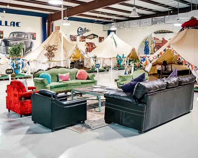 Mismatched velvet sofas and leather couches create a living room that feels like your coolest aunt's house.