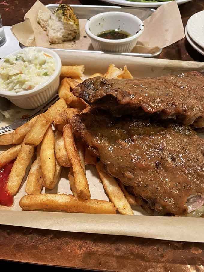 Ribs and fries on a tray, the kind of meal that makes you forget what day it is.