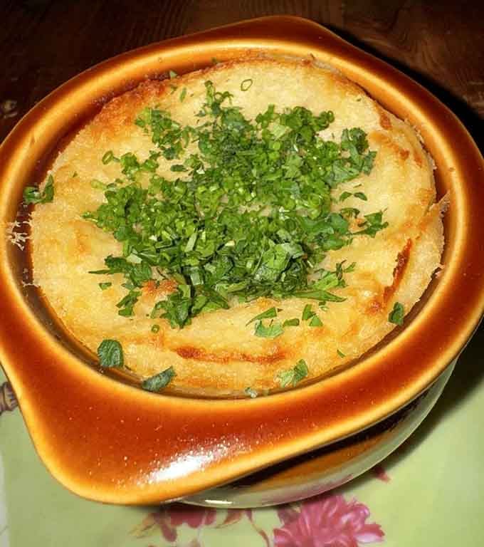 Shepherd's pie elevated to art form, proving comfort food doesn't have to apologize for being sophisticated and delicious simultaneously.