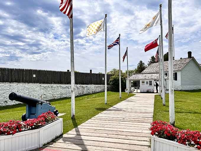 Fort Mackinac's flags snap in the lake breeze, standing guard over a history worth every step uphill.