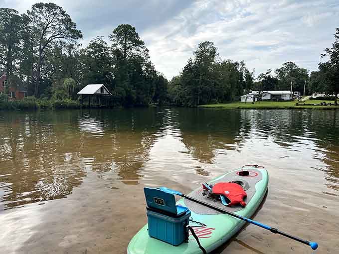 A paddleboard, a cooler, and the Magnolia River stretching out ahead. Some days just write themselves.