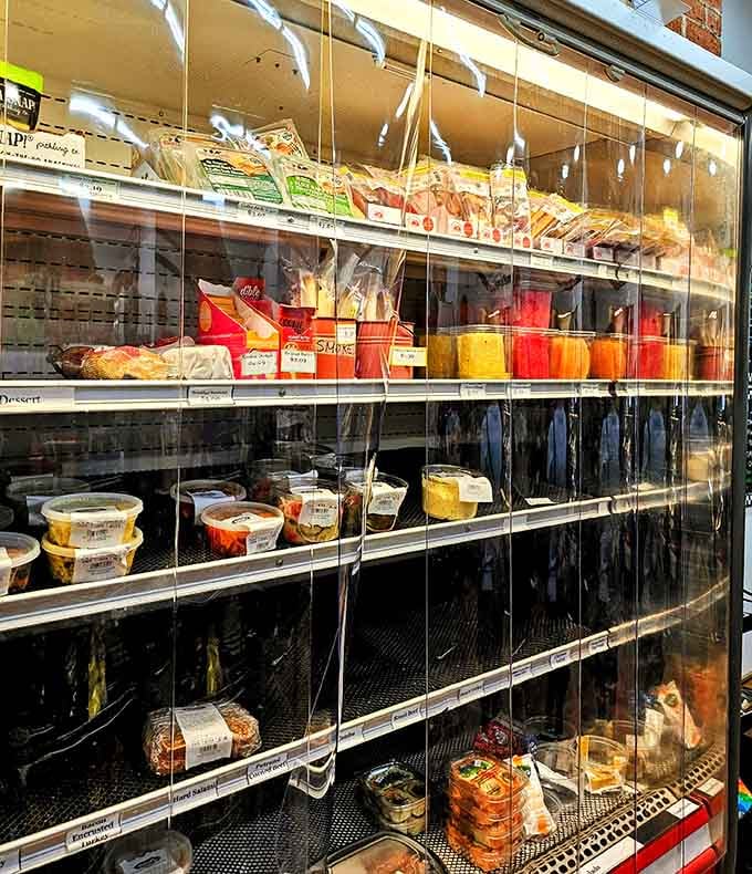 A deli case packed with ready-to-go meals and fresh salads. Lunch just got a whole lot easier.