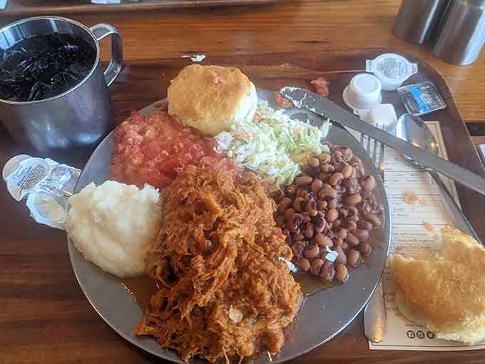 Pulled pork, black-eyed peas, and stewed tomatoes create a Southern symphony that's been perfected over centuries.