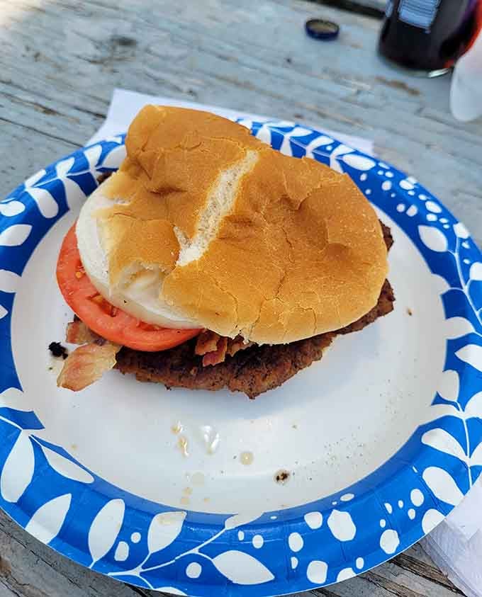 A single bacon cheeseburger that's anything but ordinary—perfectly grilled, generously topped, and ready to make your day.