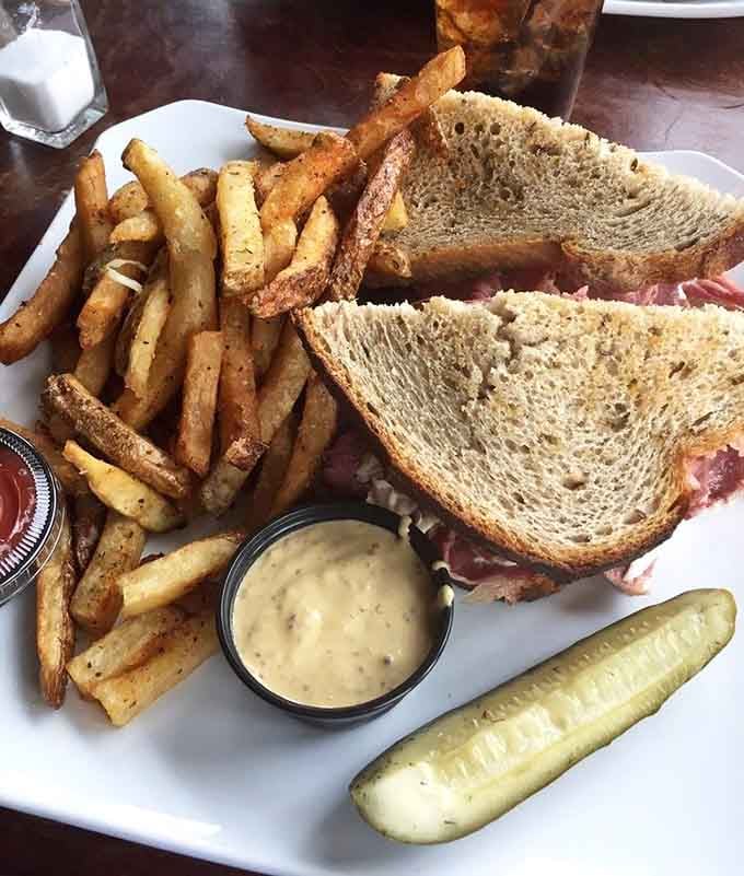 The D'Angle sandwich arrives with house mustard and a pickle, basically daring you to eat it slowly.