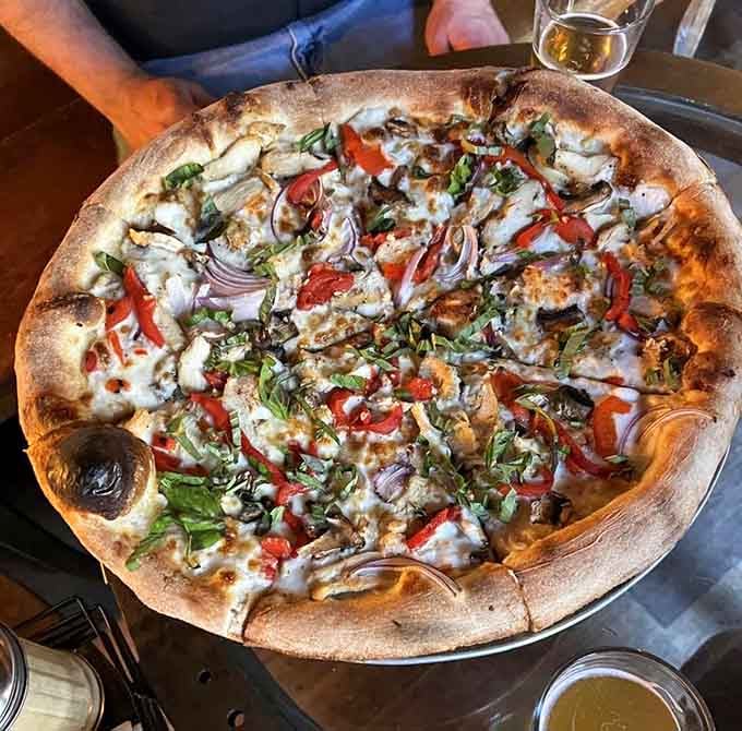 Grilled chicken, roasted red pepper, Alfredo sauce, and a name that earns its keep. The Ghost Pie is hauntingly good.