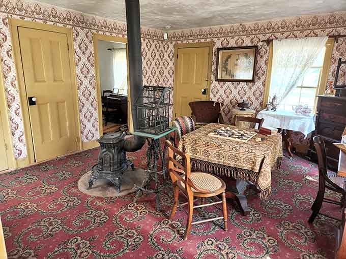 A parlor frozen in time, complete with a checkerboard waiting for a game that never quite finished.