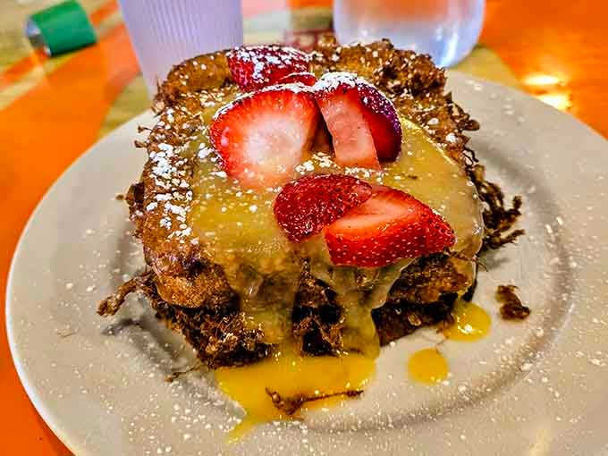 French toast dressed up with strawberries and lemon curd, because sometimes breakfast deserves to wear its Sunday best.