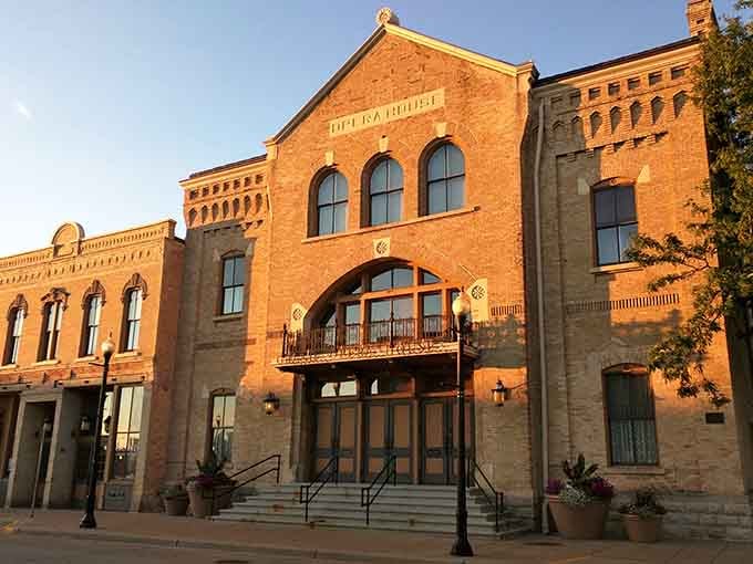 The Grand Oshkosh opera house glows at golden hour like a building that absolutely knows it's beautiful.