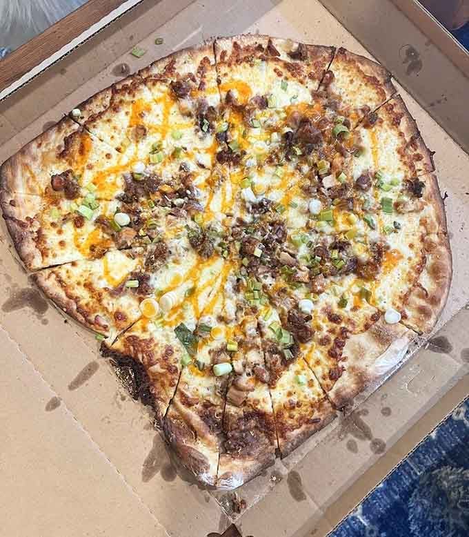 The Honey Butter Fried Chicken Pizza is what happens when two beloved Chicago institutions decide to collaborate beautifully.