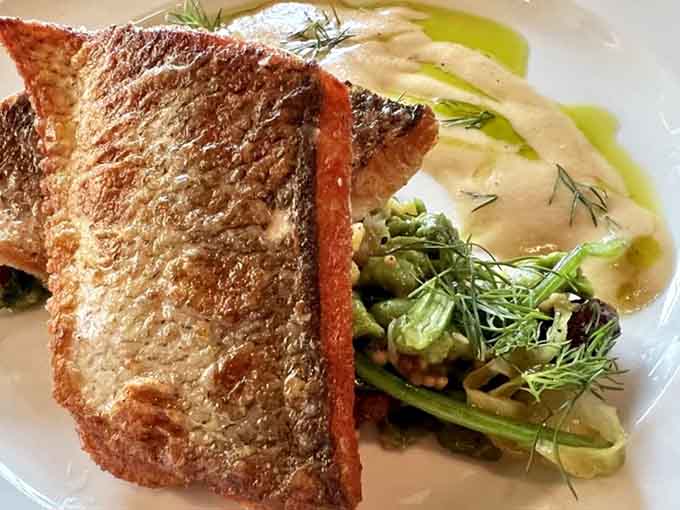 Crispy-skinned walleye so perfectly seared, it practically leaps off the plate and onto your fork.