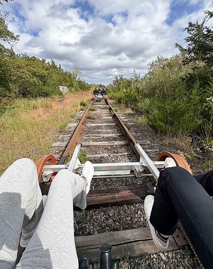 Legs out, tracks ahead, worries officially left behind somewhere back at the station.