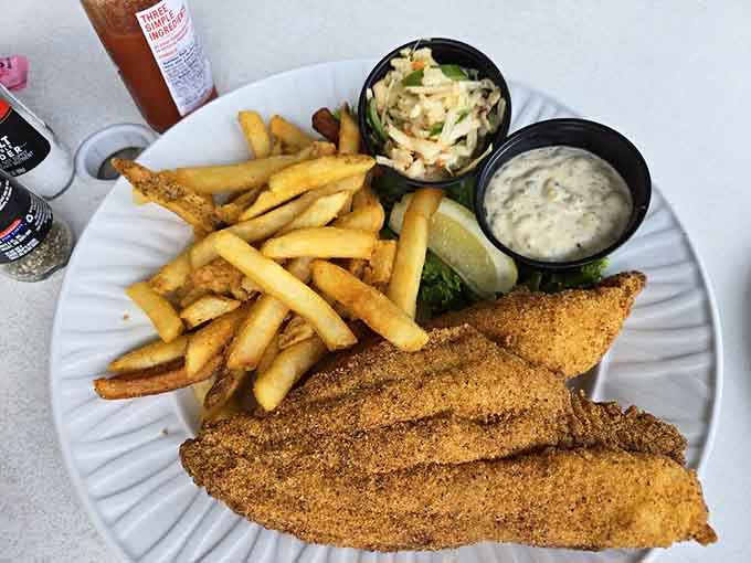 Crispy fried catfish with fries and slaw, comfort food that earns every single bite.