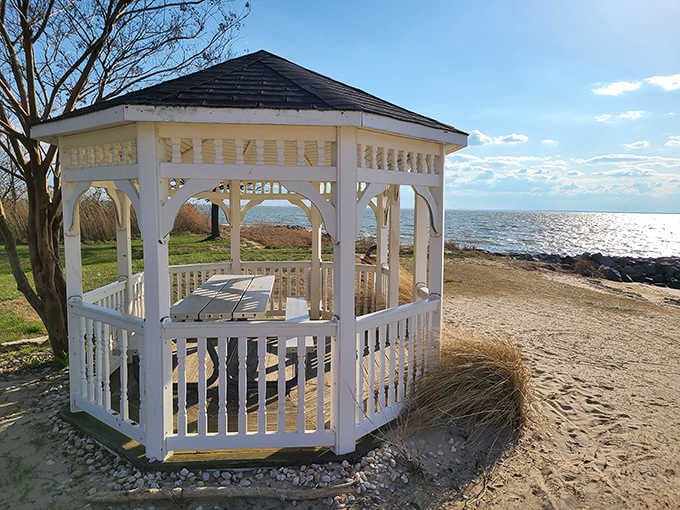 A white gazebo, sea grass, and Chesapeake Bay views. Rock Hall's park gazebo earns its postcard moment.