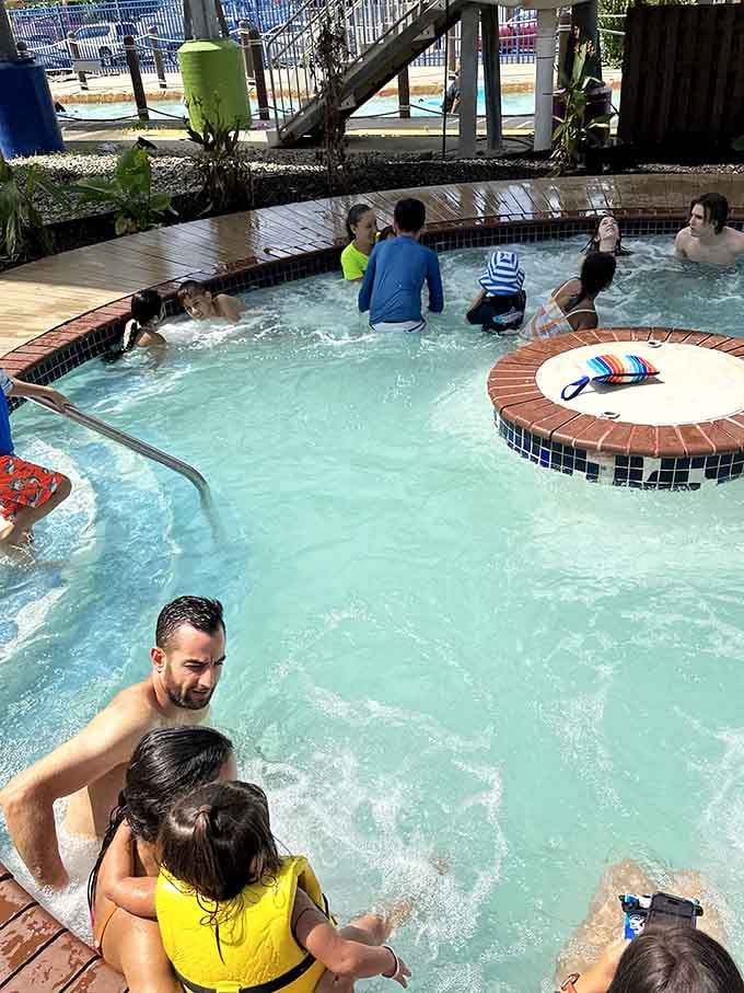 A warm, bubbling pool tucked into the park where tired legs and happy families find a perfect midday reset.