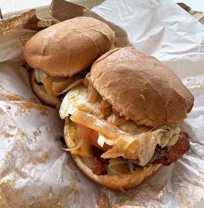 A bacon cheeseburger that doesn't apologize for itself, wrapped in paper and ready to make your afternoon considerably better.