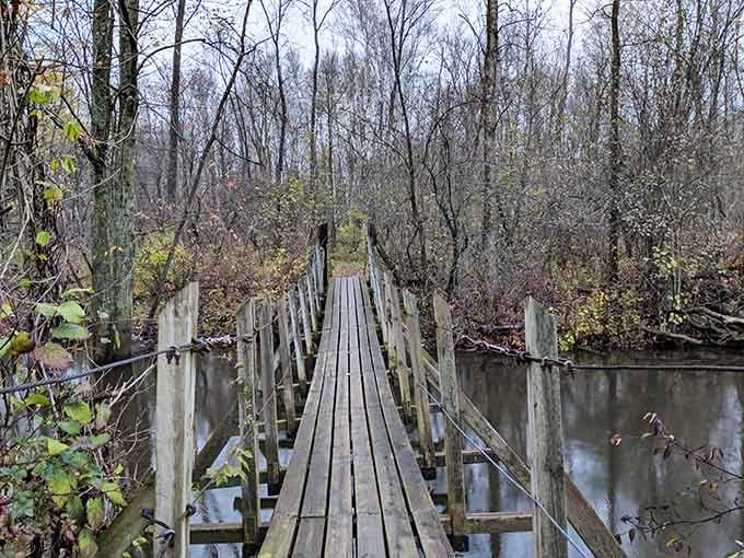 This wooden bridge has seen better days, but crossing it feels like stepping into a different century entirely.
