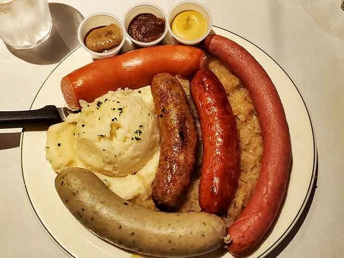 A full parade of German sausages with mashed potatoes and sauerkraut. Every single one earned its spot.