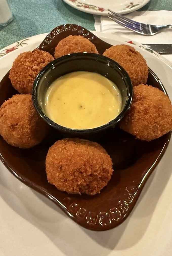 Golden, crispy sauerkraut balls with honey mustard dipping sauce. The appetizer that makes you forget everything else on the menu.