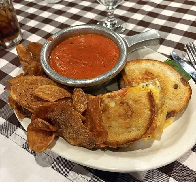 A Triple Cheese Sandwich with Tomato Basil Soup on the side. Comfort food that actually delivers on its promise.