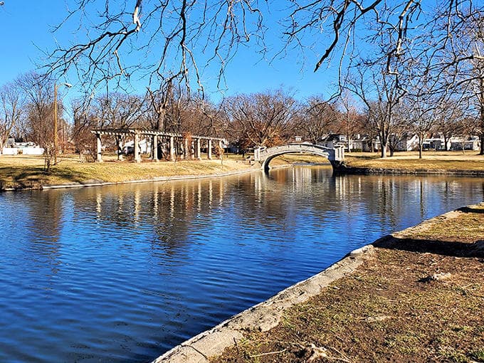 Liberty Park's peaceful waters reflect a town that understands the value of green space and quiet Sunday afternoons.