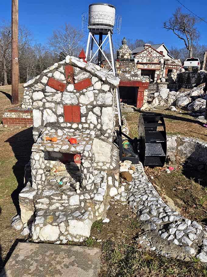 A stone building with a large pipe chimney on top. Industrial charm meets folk art in the most unexpected way.