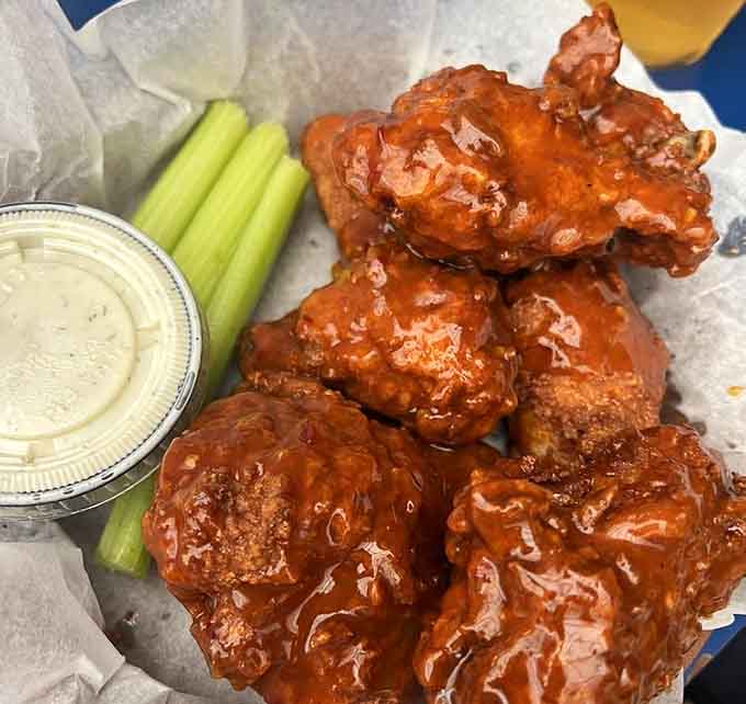 Saucy, sticky, gloriously messy wings that demand your full attention and at least three napkins, minimum.
