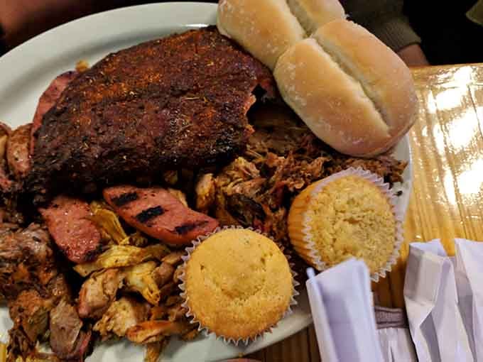 Ribs, pulled pork, sausage, and cornbread muffins on one plate, Minnesota doing Memphis proud.